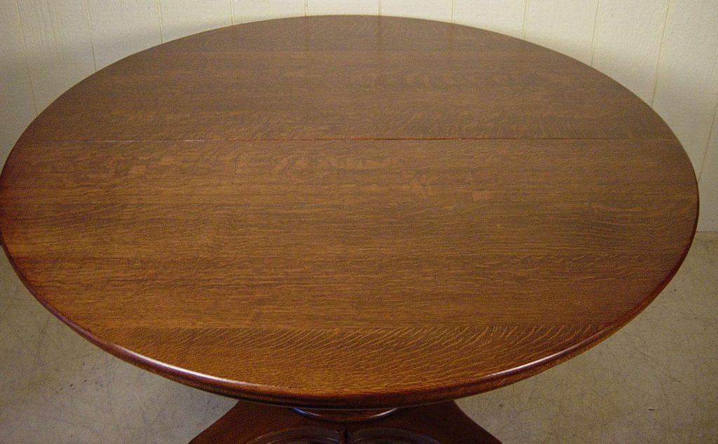 54" Round Oak Dining Table with 9 original leaves - Doug Schmitt Antiques